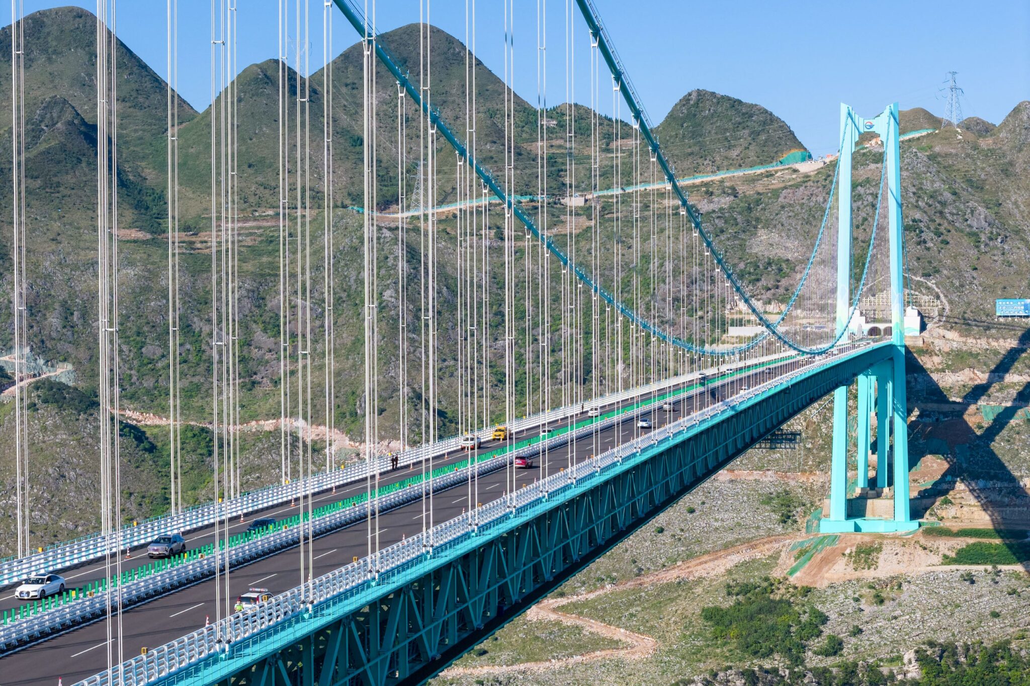 Step Into the Clouds: Visiting Guizhou’s Huajiang Canyon Bridge - CHINA ...